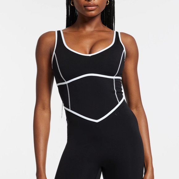 Bandier | Tops | Bandier Vneck Tempo Contrast Seam Catsuit | Poshmark